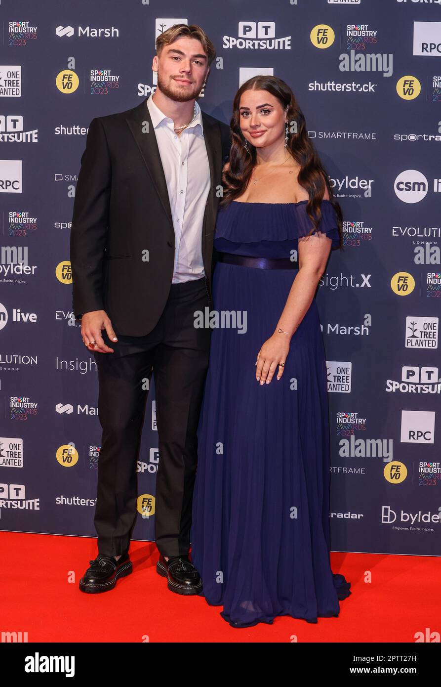 London, UK. 27th Apr, 2023. Ollie Hassell-Collins (L) and guest seen ...