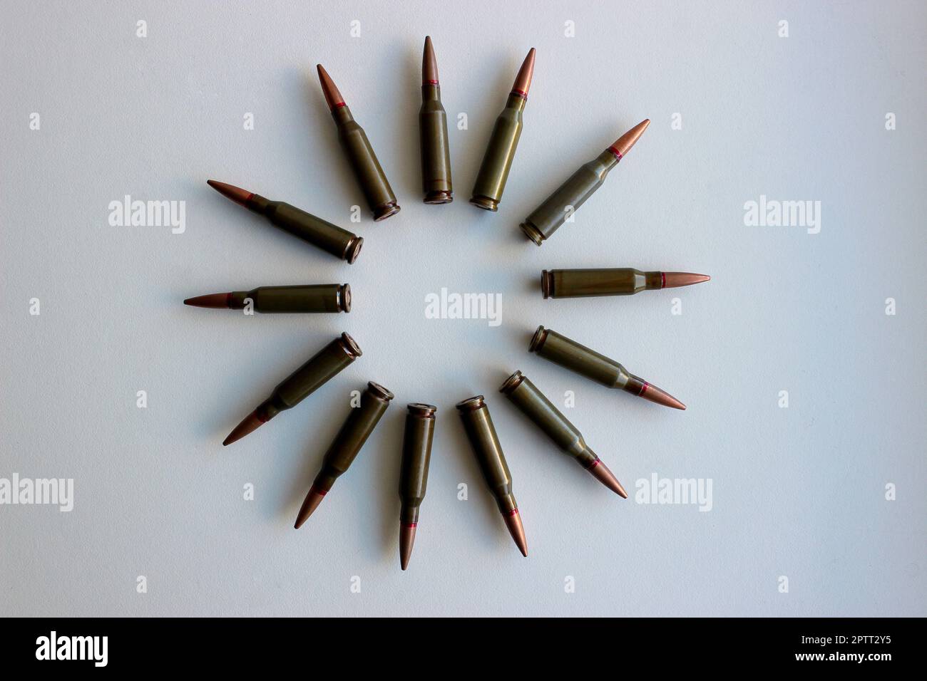 Circle lined with live ammunition isolated on white top view stock ...