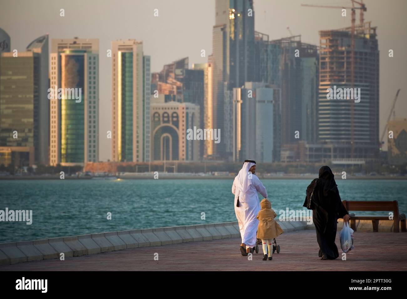 Qatar, Doha, skyline, Qatari family Stock Photo - Alamy