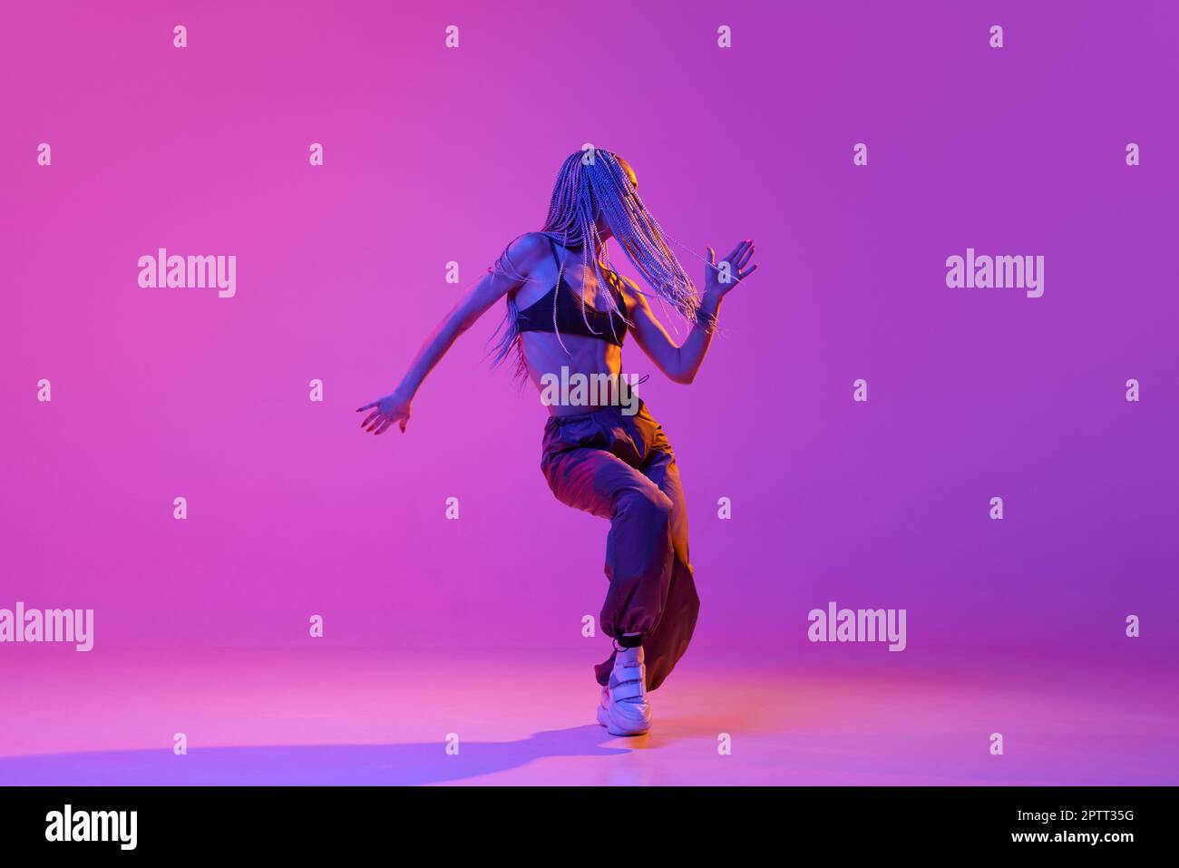 Portrait with one young girl, dancer with dreadlocks dancing over ...