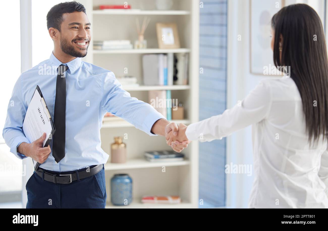 Mixed Race Business People Shaking Hands