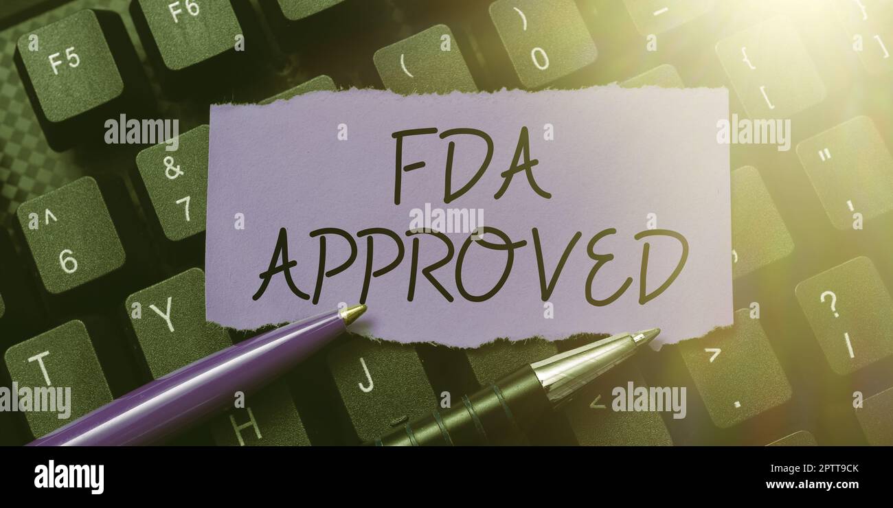 Sign displaying Fda Approved, Word for FDA agreed the product or ...