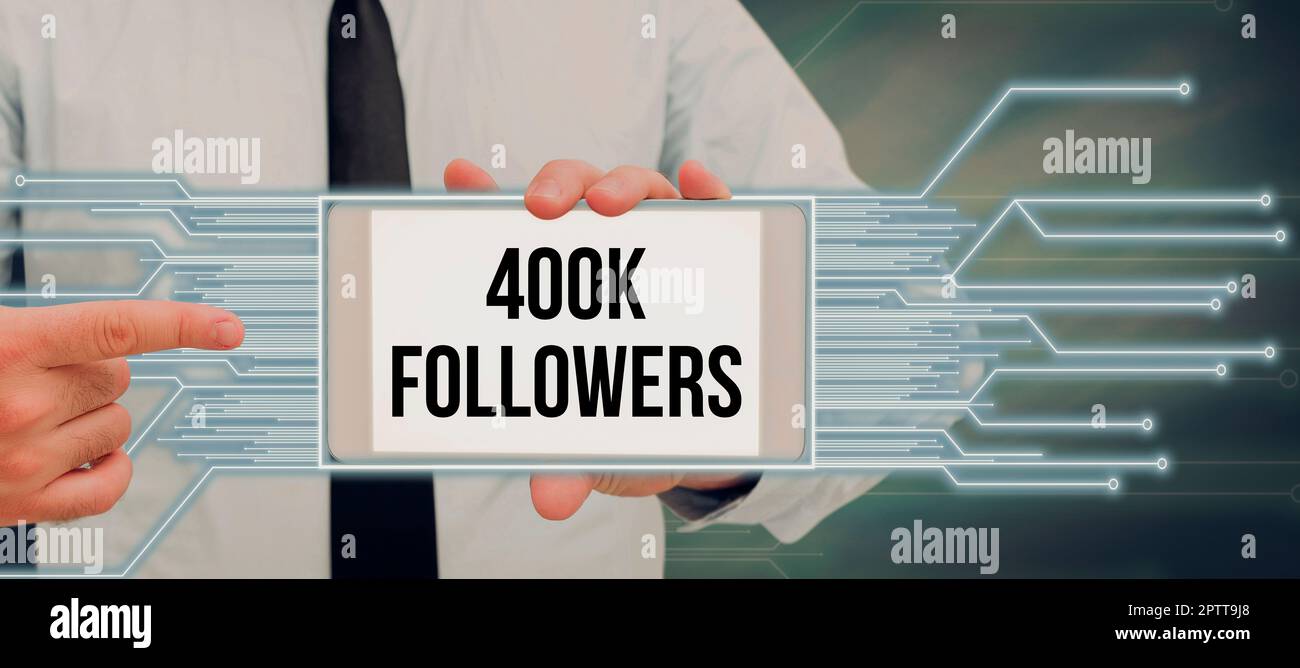Sign displaying 400K Followers, Word Written on number of individuals ...