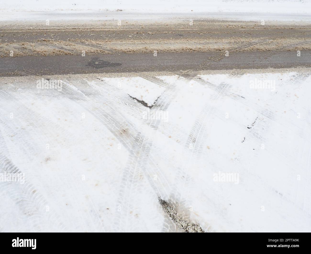 Snowdrifts on the side of the road. Bad weather and traffic. Snow on ...
