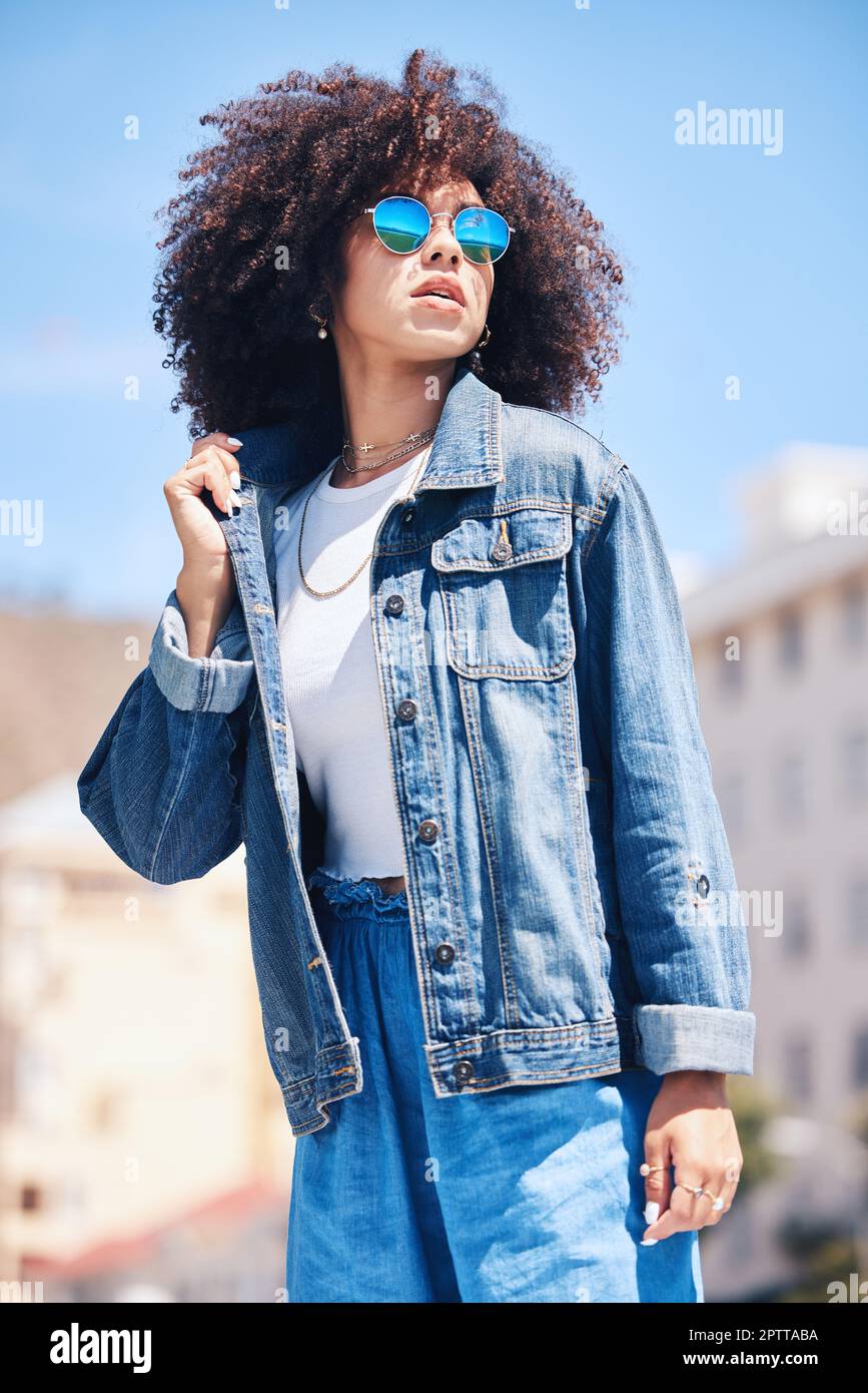 Cool and fashionable hispanic woman wearing sunglasses outside ...
