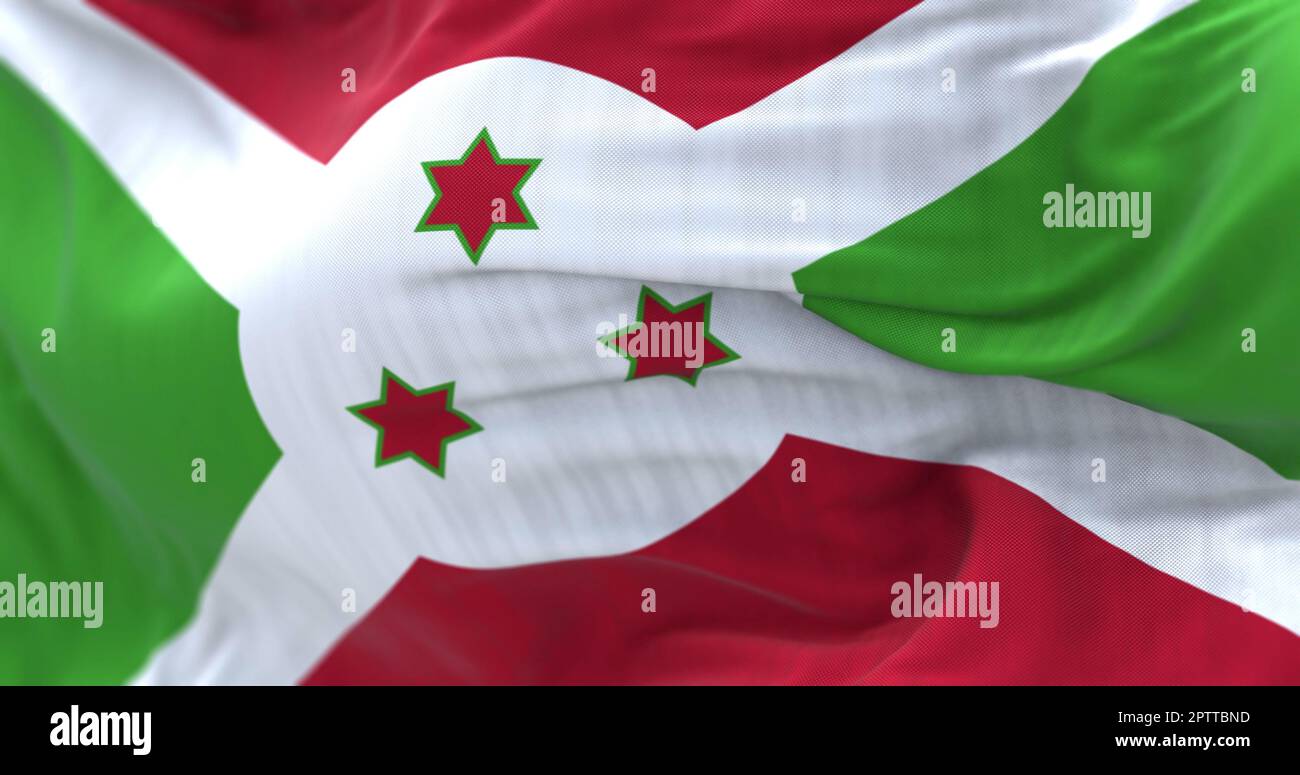 Close-up view of the Burundi national flag waving in the wind. The ...