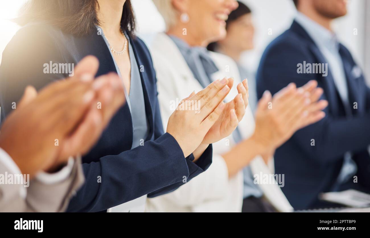Happy businesswoman clapping hands for presentation during a meeting in an office boardroom with ...