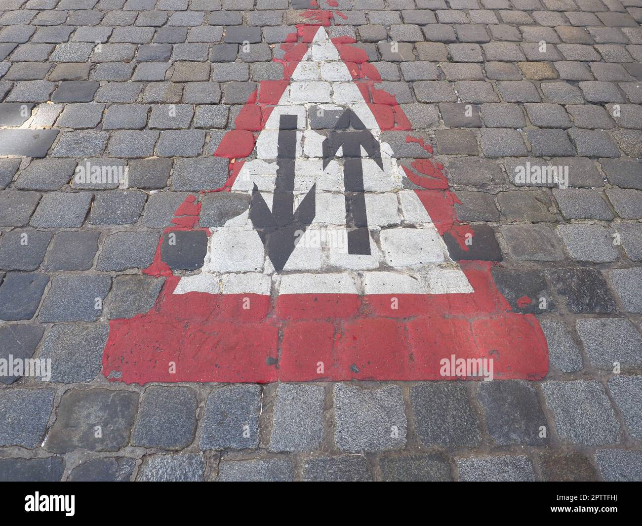 Warning signs, two way traffic sign painted on a road Stock Photo - Alamy