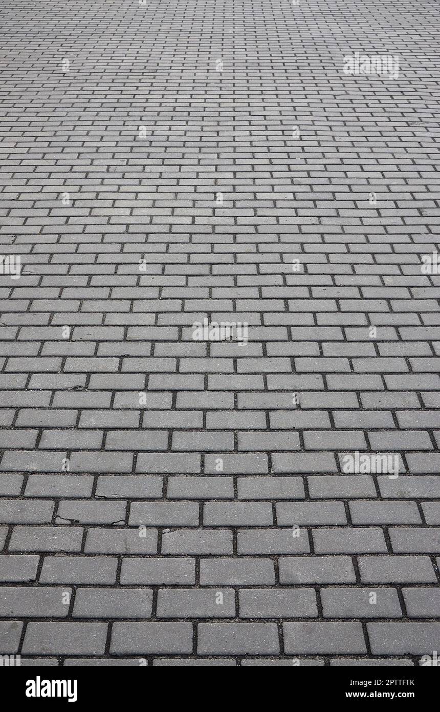 Photo of the site from the old paving slab with small defects and ...