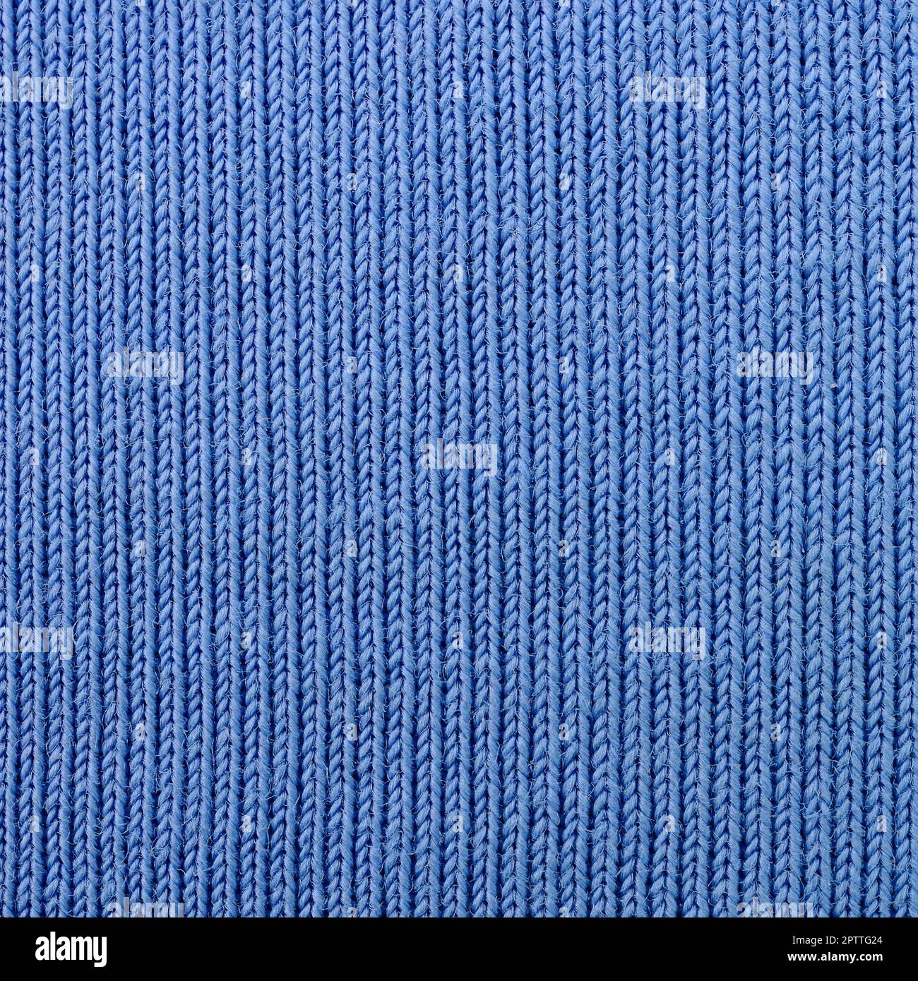 The texture of the fabric in blue color. Material for making shirts and ...