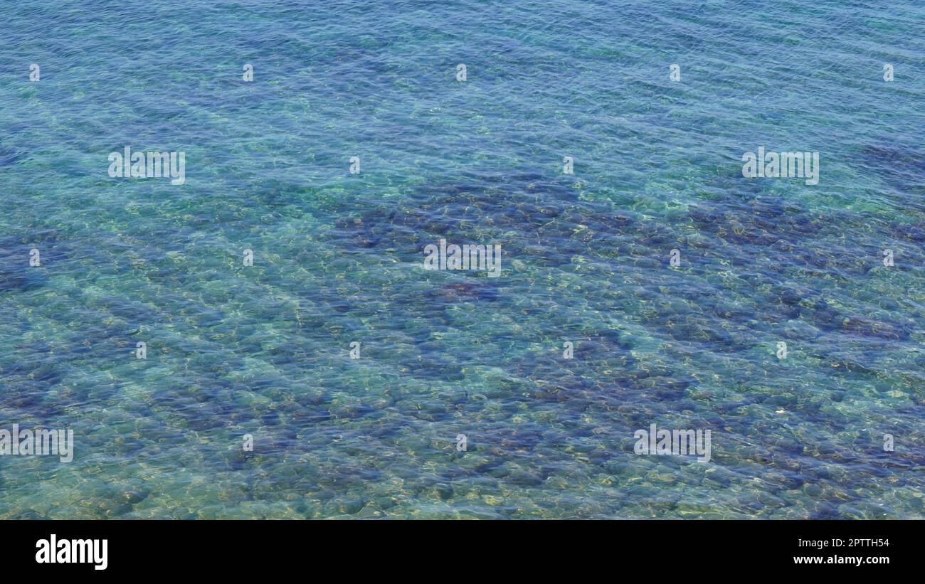 Light blue water ripple background. Tranquil sea water Stock Photo - Alamy