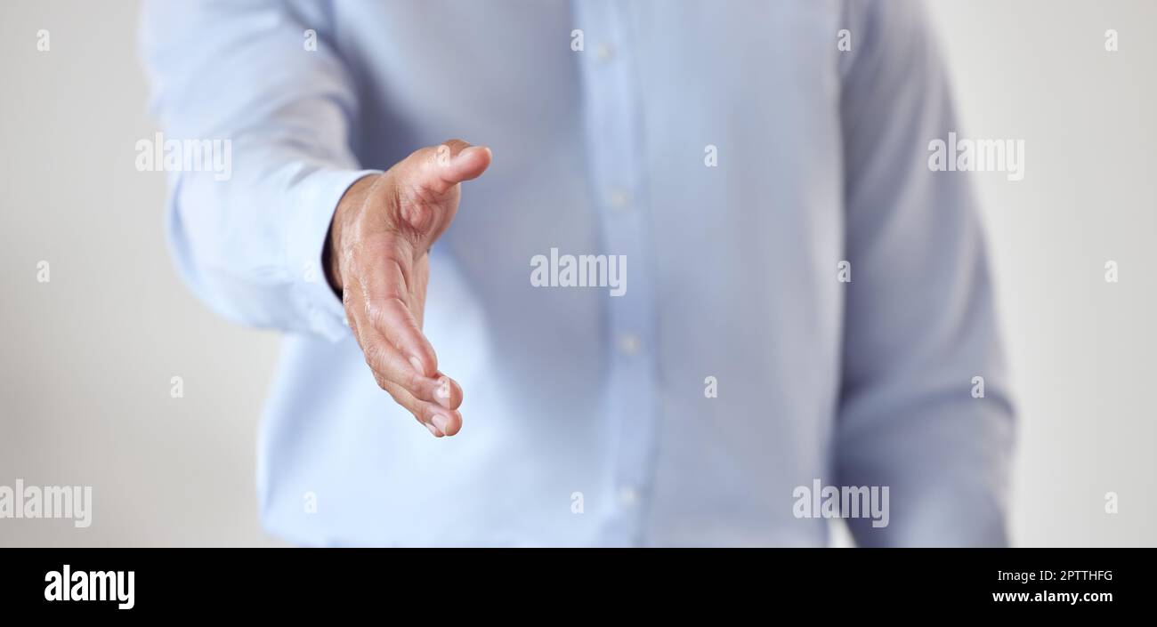Man extending hand in help hi-res stock photography and images - Alamy
