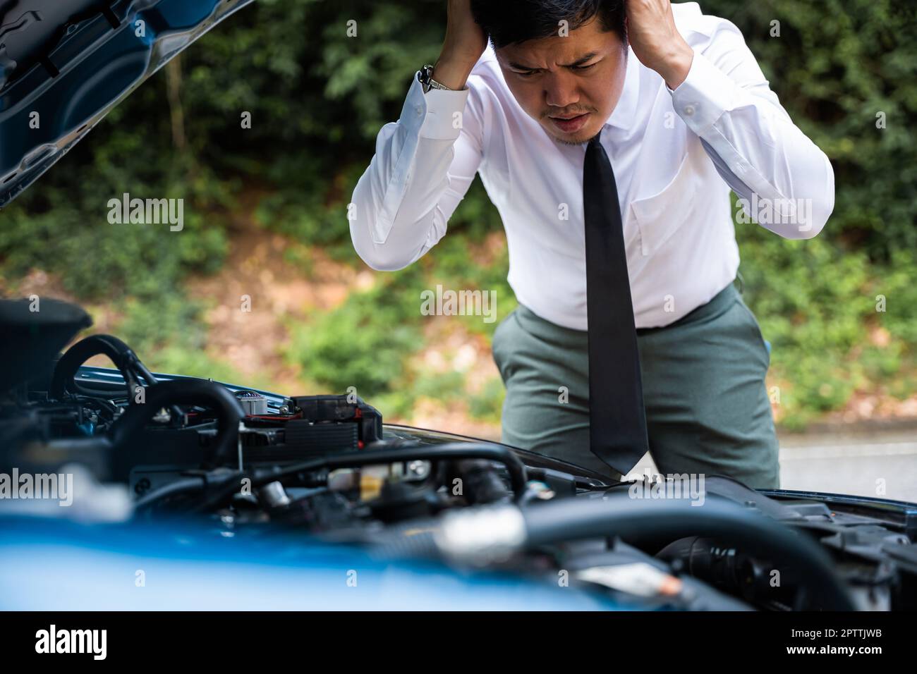 Asian businessman car broken breakdown, young stressed man having ...