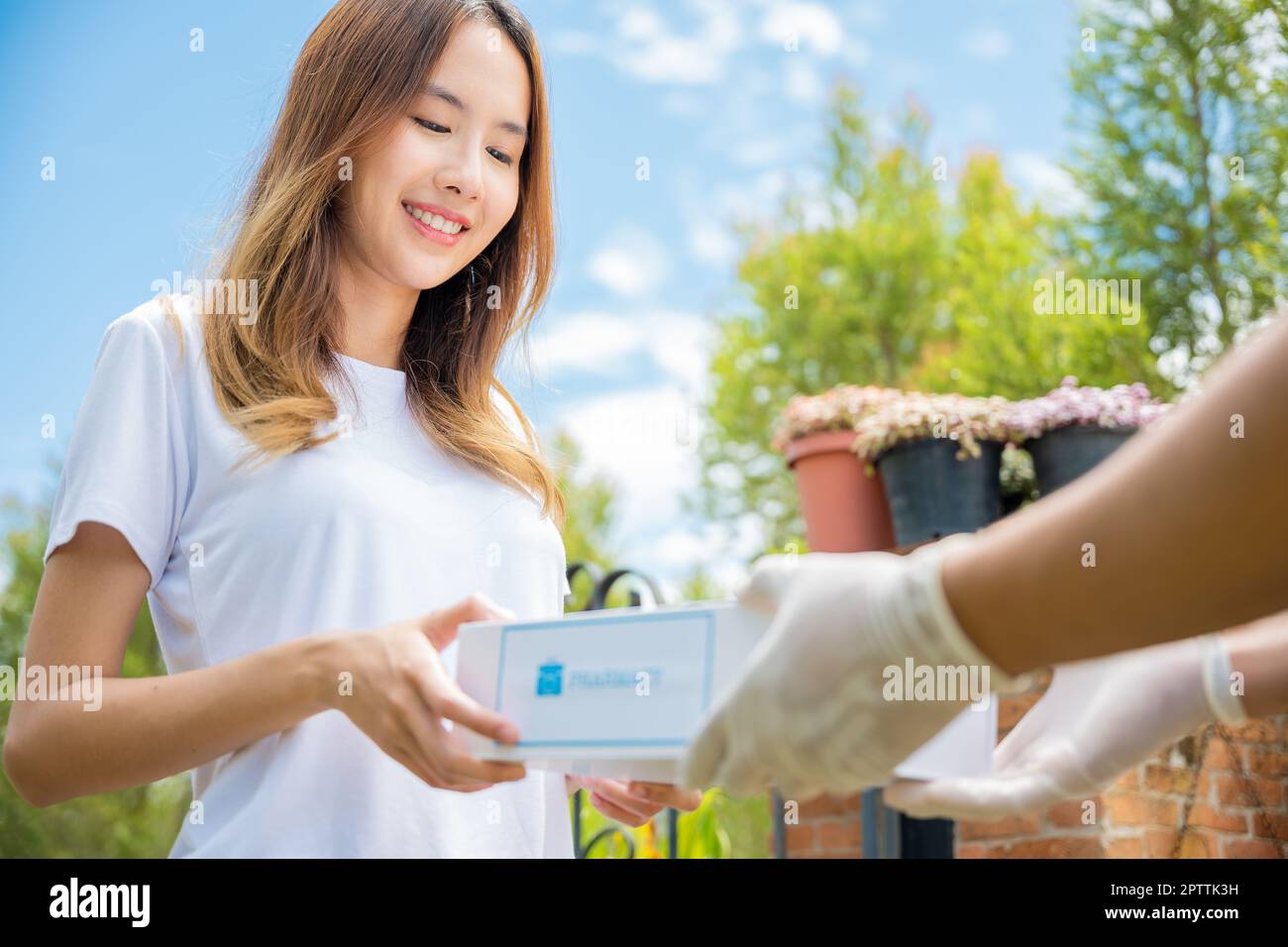 Asian woman sick she receive medication first aid pharmacy box hospital ...