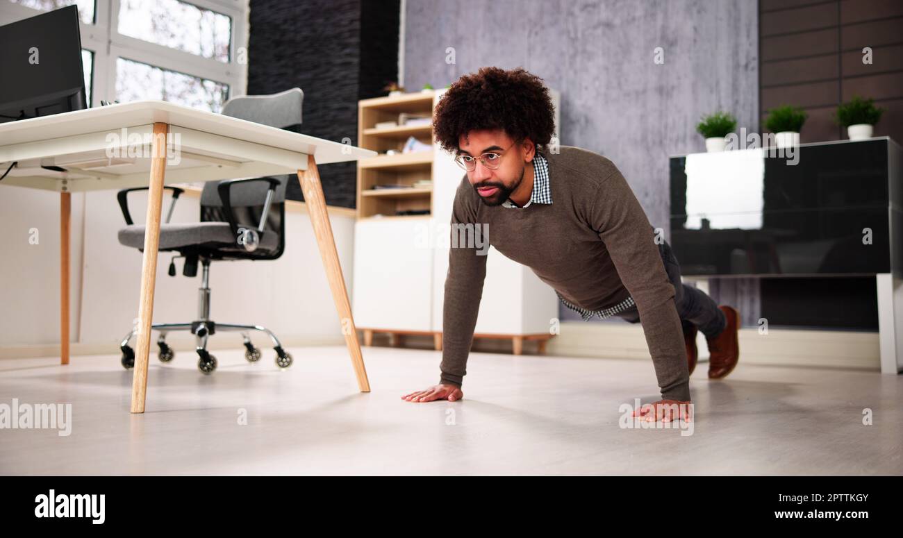 Workout Office Exercise. Healthy African American Doing Pushups Stock ...