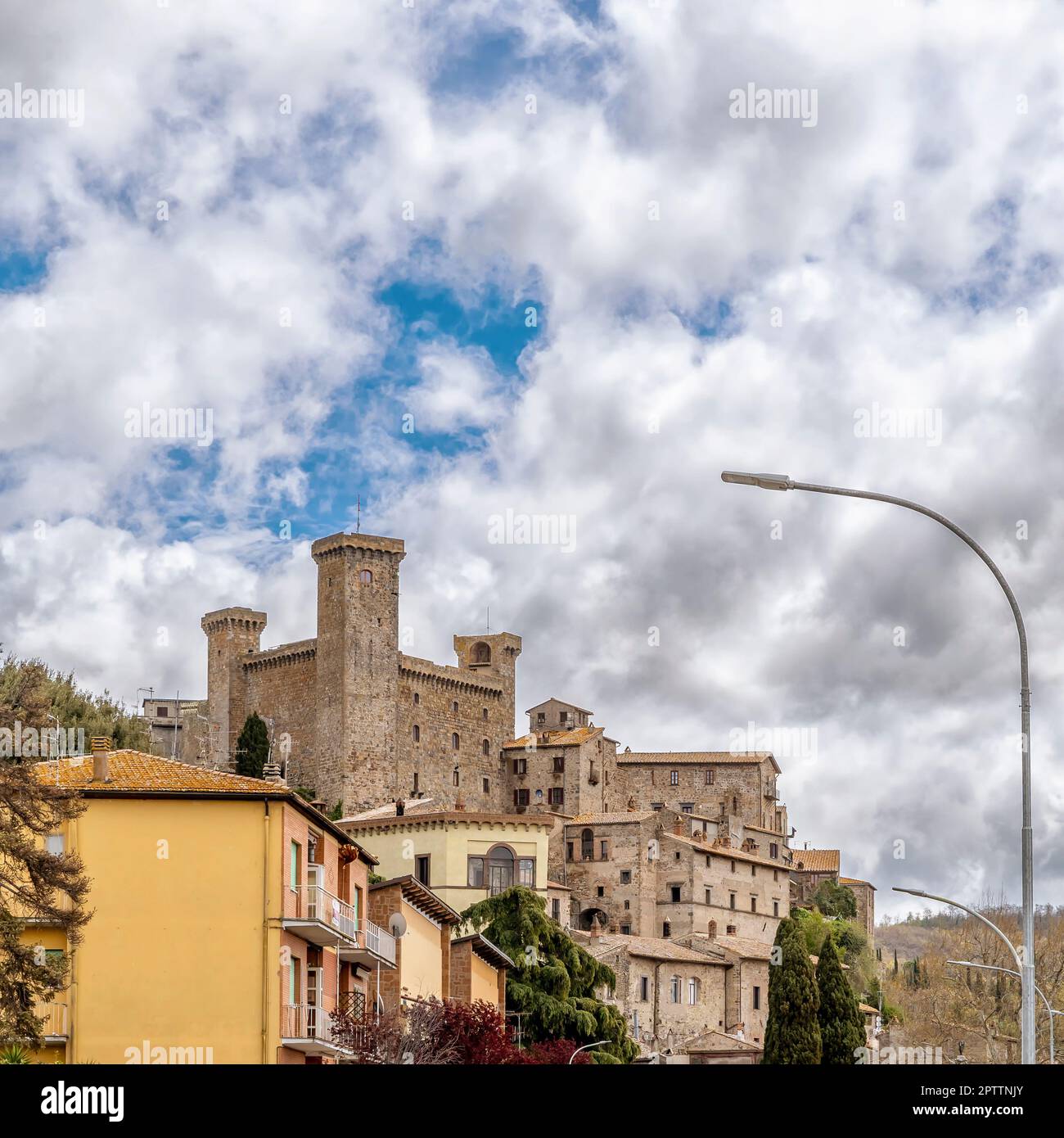 The historic center of Bolsena, Viterbo, Italy, under a dramatic sky ...