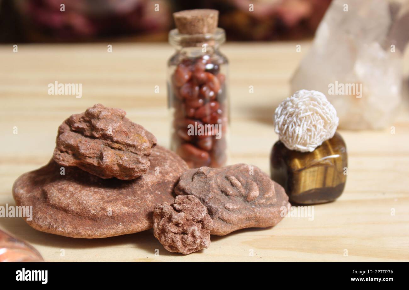 Desert Rose Rock Varieties With Jar of Agate Stones Stock Photo - Alamy