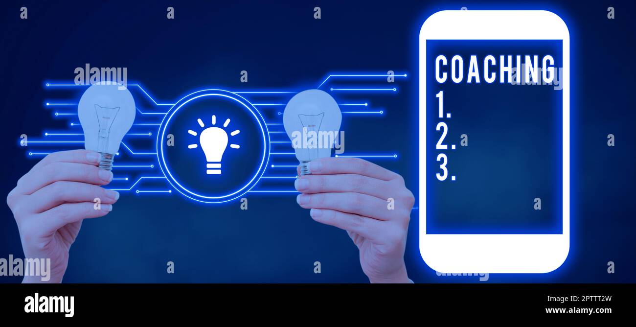 Writing displaying text Coaching, Business concept unlocking a persons ...