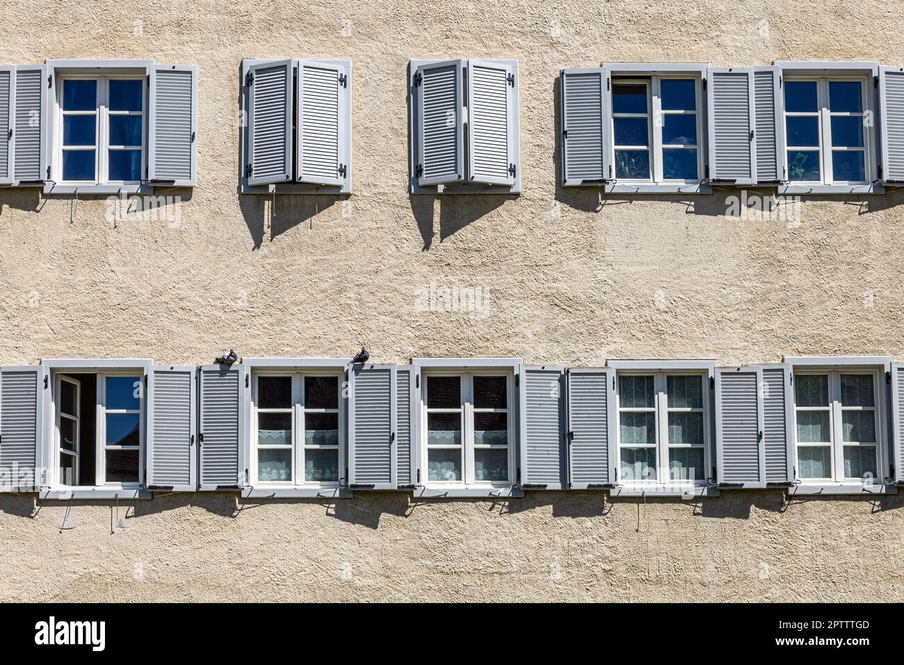 windows in the facades of beautiful houses Stock Photo - Alamy