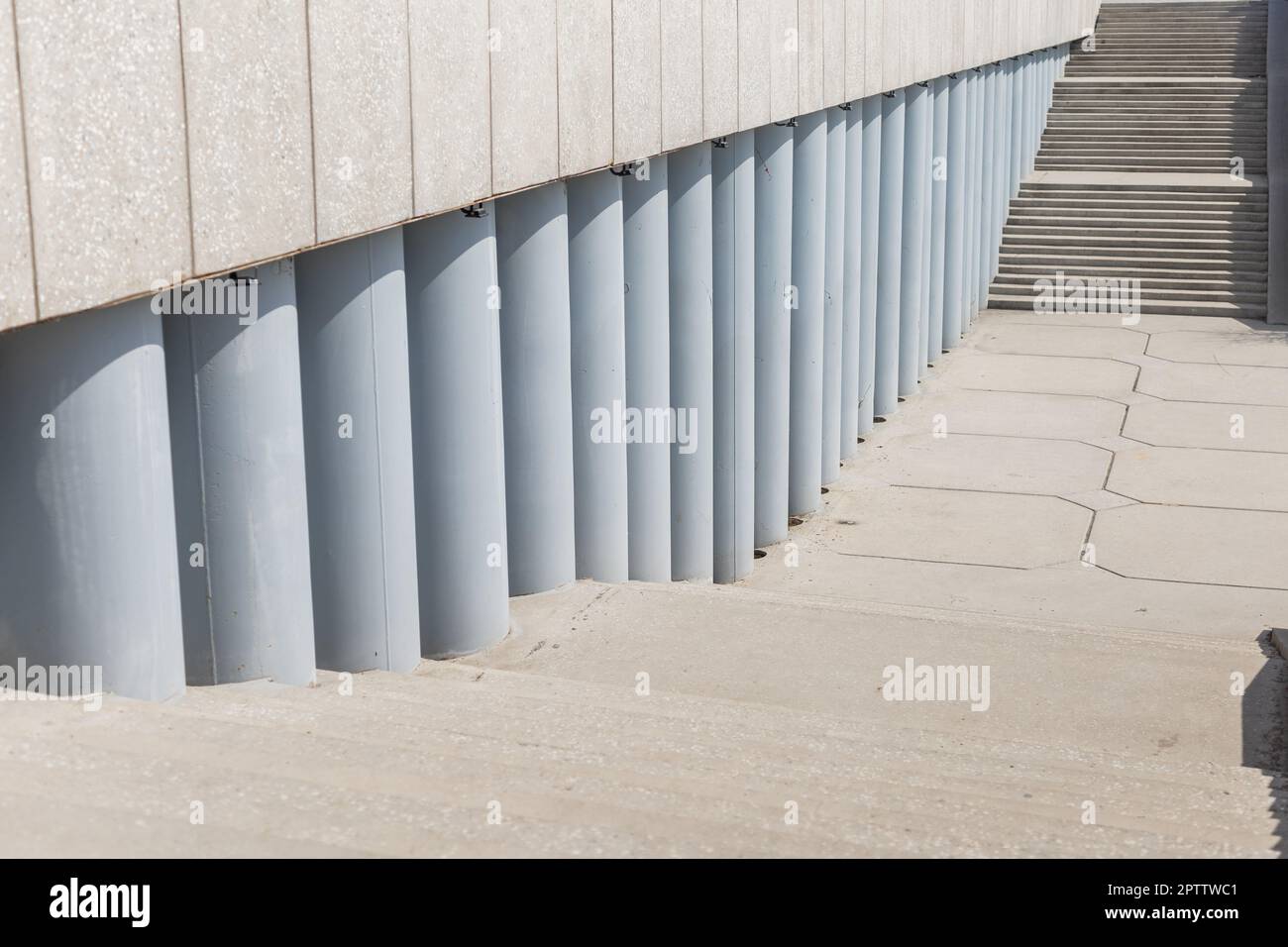 Embankment stairs and industrial style concrete columns Stock Photo - Alamy