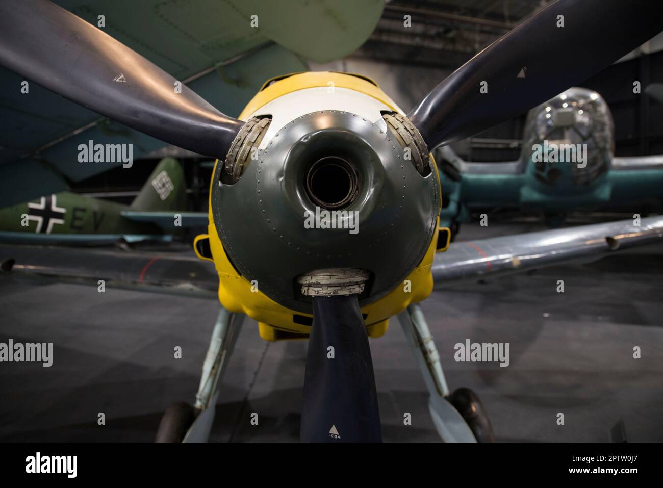 nose cannon of a Messerschmitt Bf 109E-3 with a Heinkel He111 in the ...