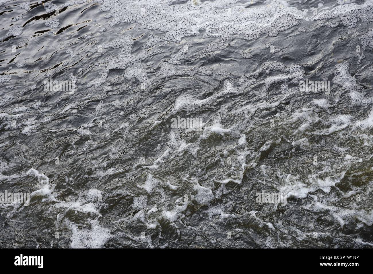 Waves of water of the river and the sea meet each other during high ...