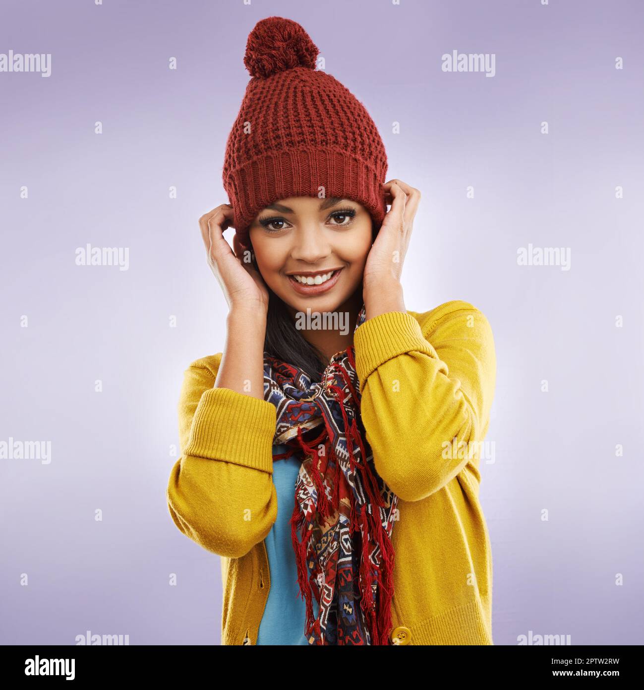 Looking good in her winter wear. Cropped portrait of a young woman ...