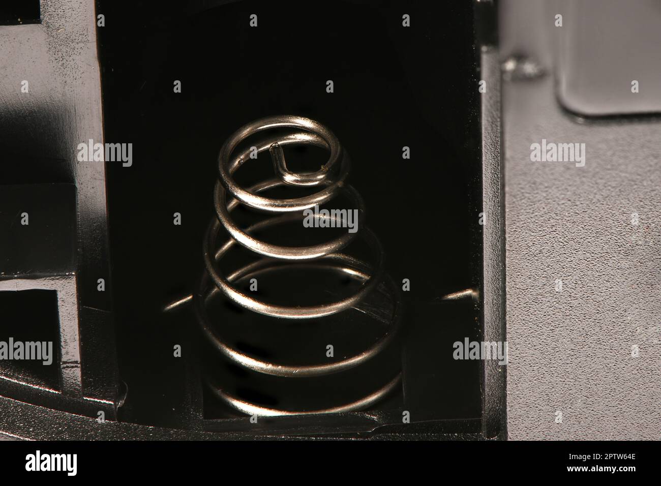 Power supply compartment for a wireless computer mouse. Extrem close-up ...