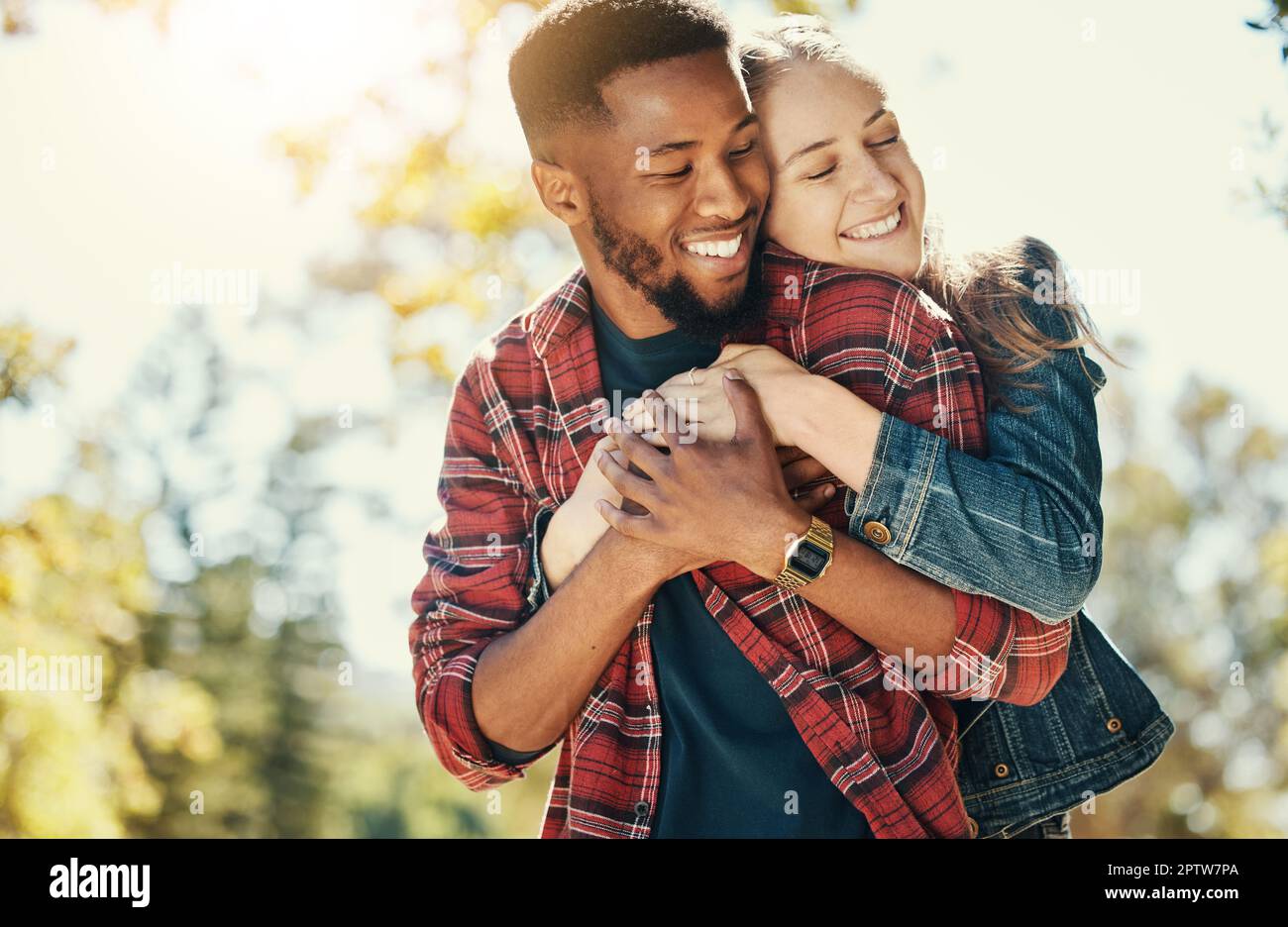 Love, nature and diversity couple hug on outdoor journey together ...