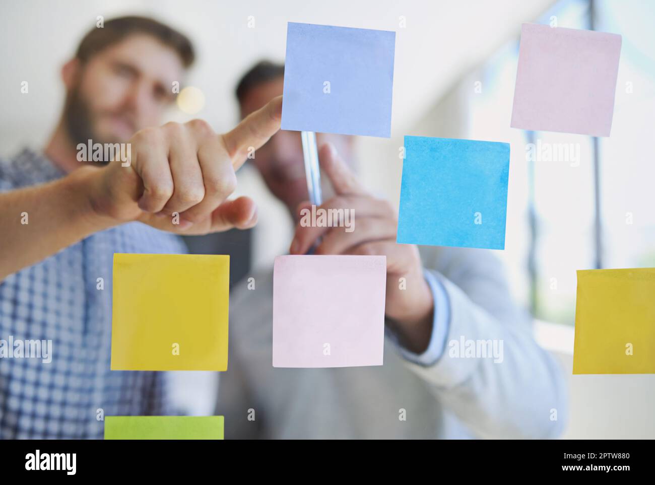 Businessman thinking during a meeting hi-res stock photography and ...