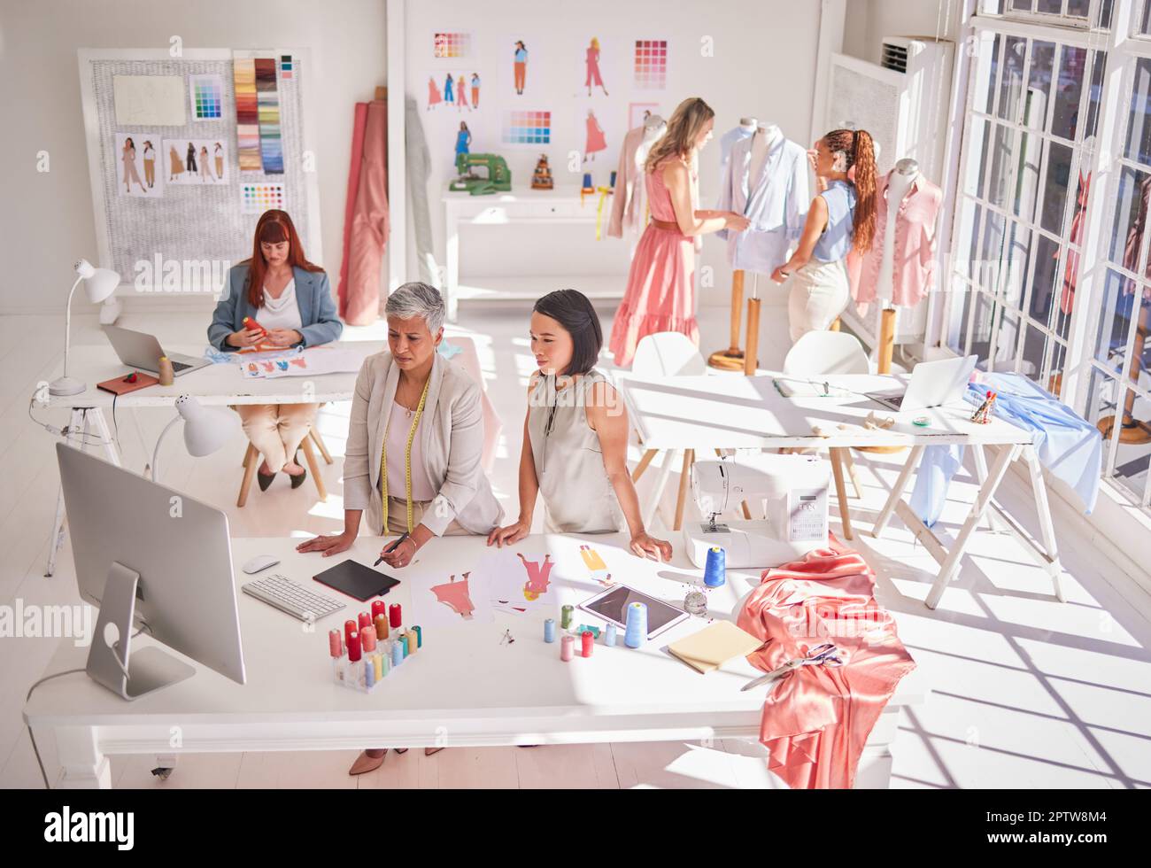 Clothes production, designer and women working on fashion, fabric and ...