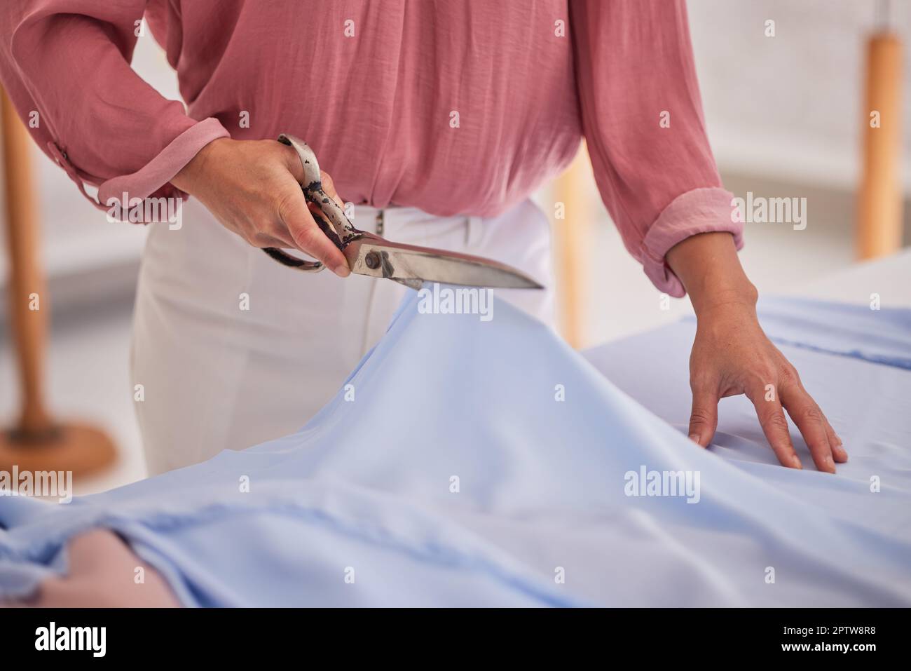 Fabric, fashion designer hands and textile scissor of a black woman ...