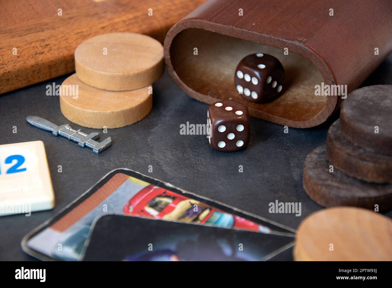 Variety of board game pieces, black background, close-up Stock Photo ...