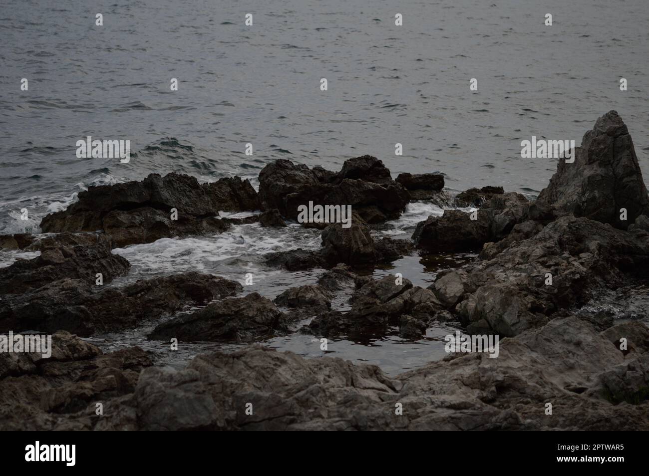 Sea waves crashing into rocks.Sea waves crashing into rocks. Storm at ...