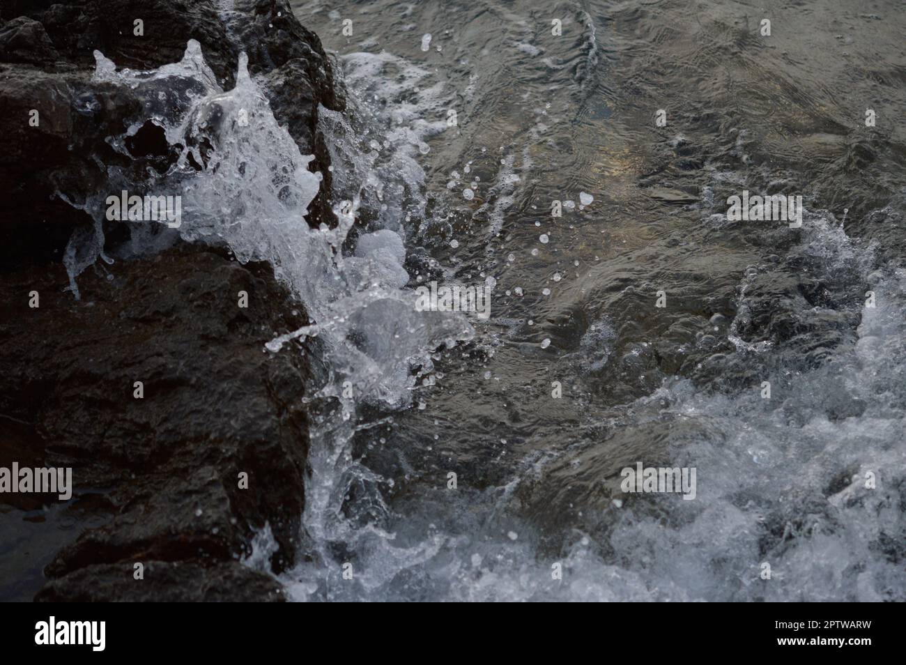 Sea waves crashing into rocks.Sea waves crashing into rocks. Storm at ...