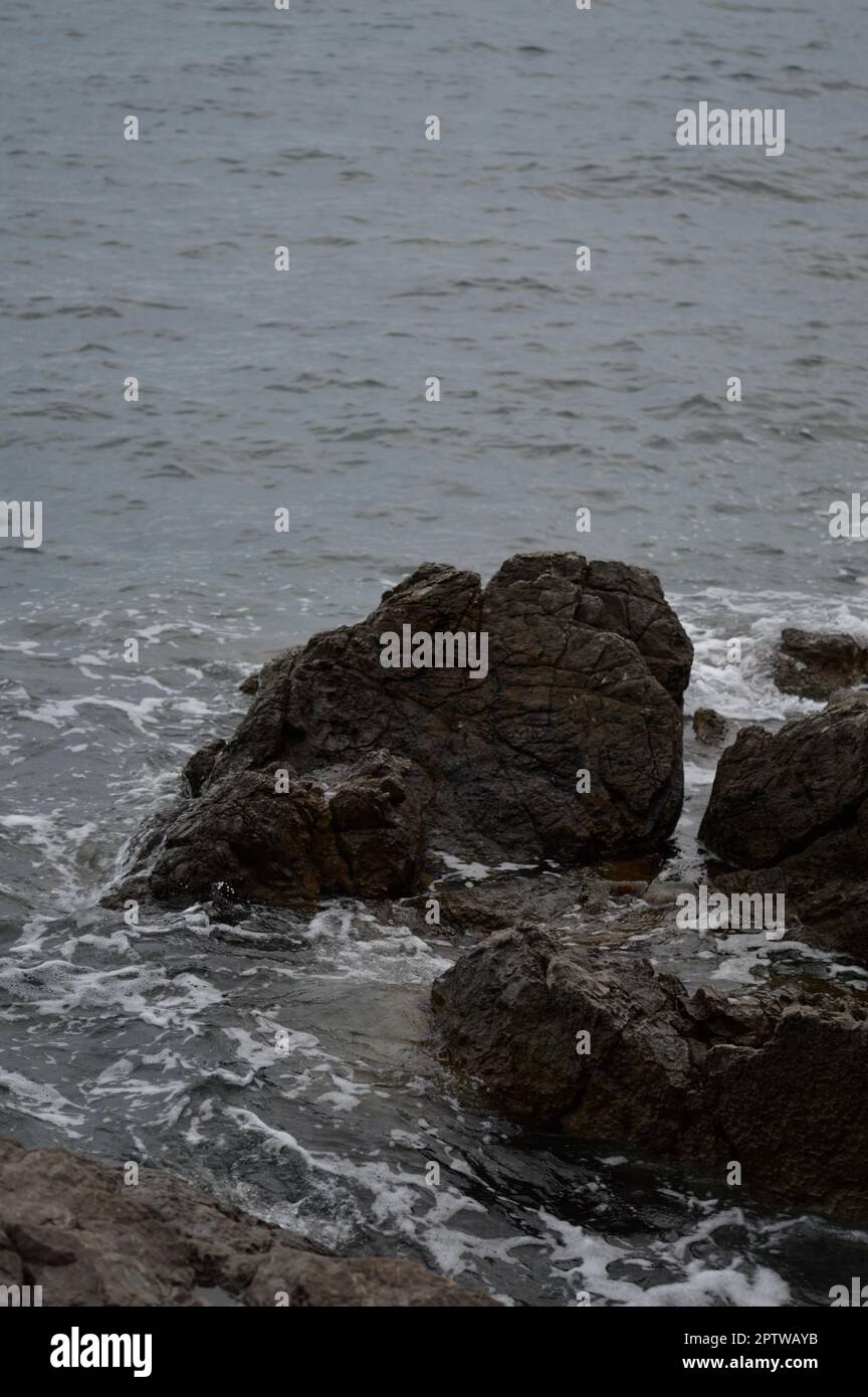 Sea waves crashing into rocks.Sea waves crashing into rocks. Storm at ...