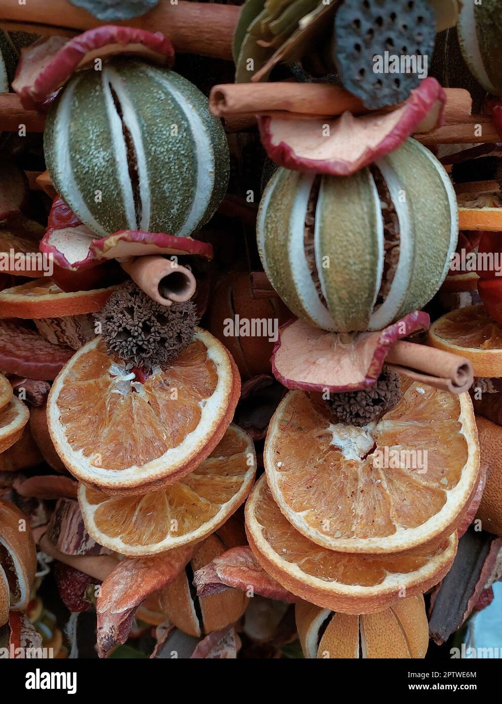 Christmas decoration made of fragrant dried strung fruits. Background ...