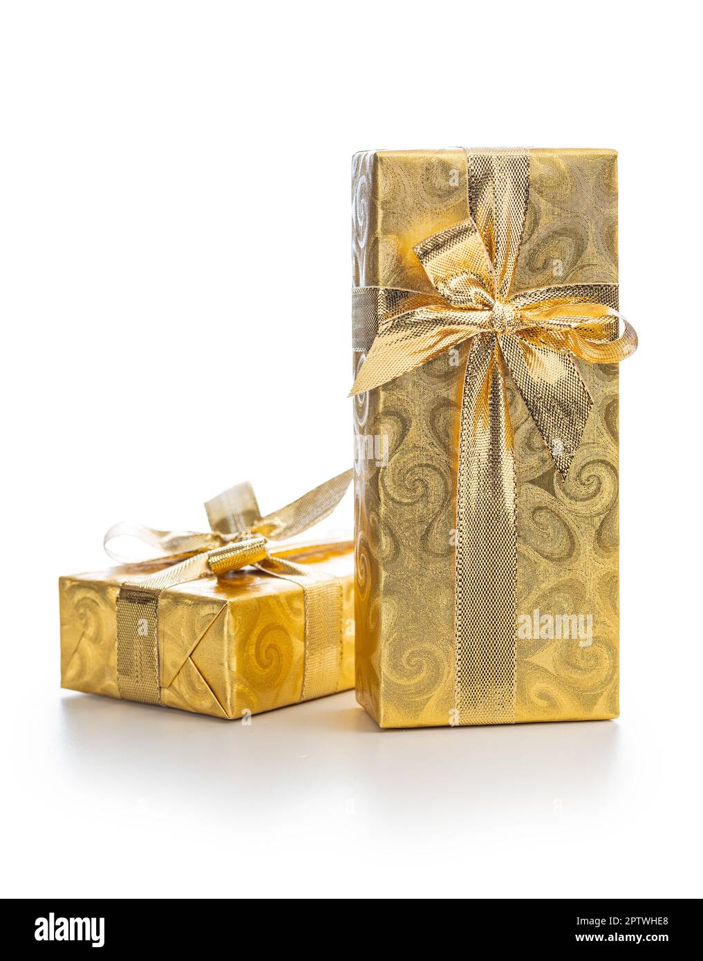Gift wrapped in gold foil. Christmas present with gold ribbon isolated ...