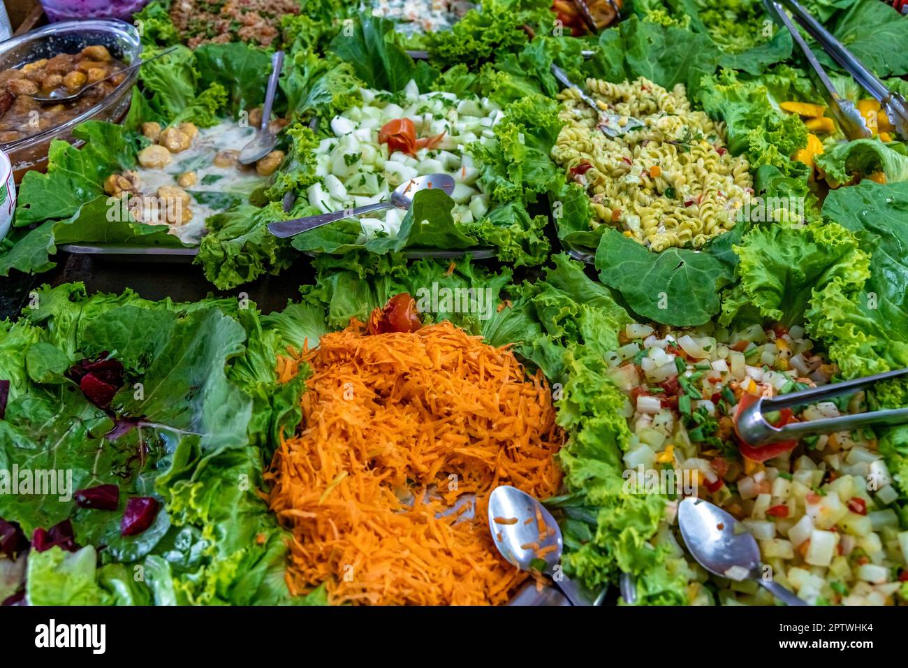 vegetable and pasta salads on the buffet table Stock Photo - Alamy