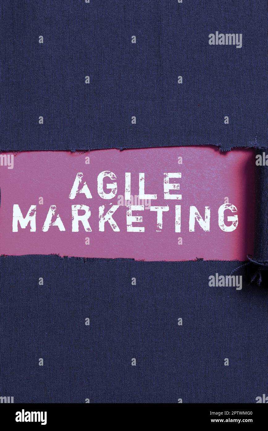 Hand writing sign Agile Marketing, Business showcase focusing team ...