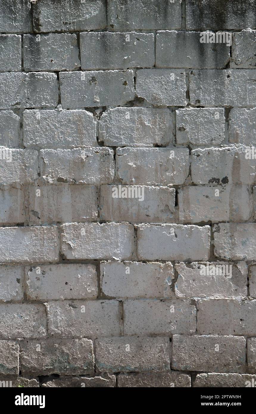 Texture of brick wall from relief stones under bright sunlight Stock ...