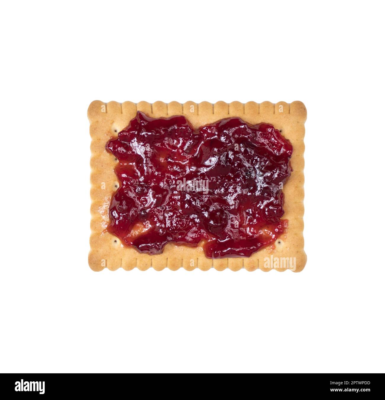 Some dry biscuits with jam on a white surface on a transparent ...