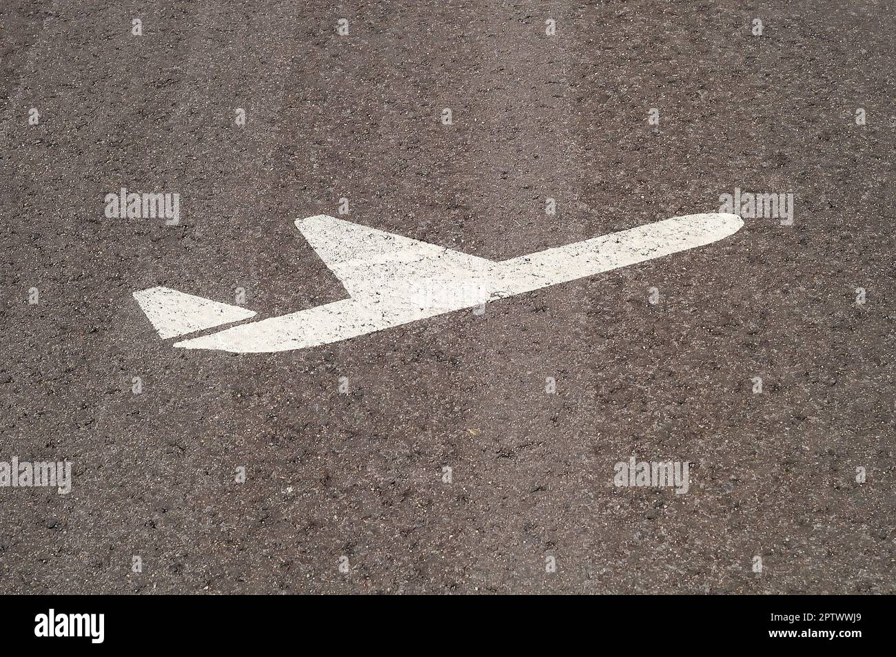 Airplane symbol as lane marking or road marking on a road Stock Photo ...