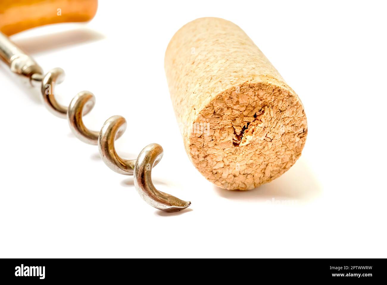 A simple corkscrew with a wooden handle and a metal screw spindle Stock ...