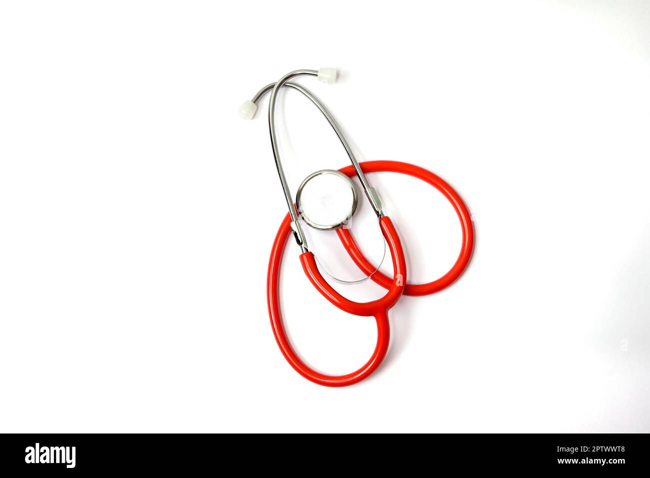 Red stethoscope, close up and still life of a modern stethoscope for ...