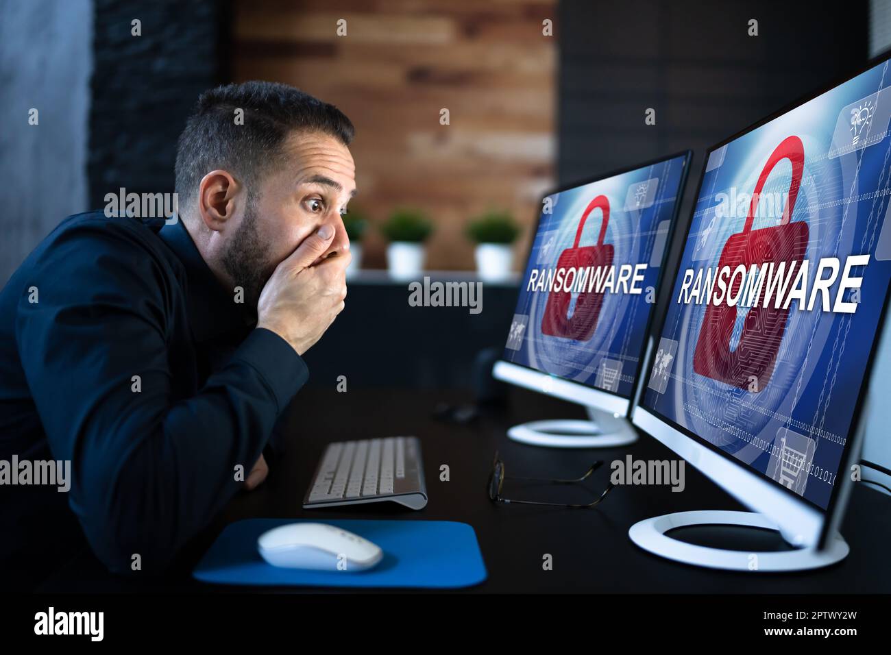 Ransomware Malware Cyber Attack On Business Computer Stock Photo - Alamy