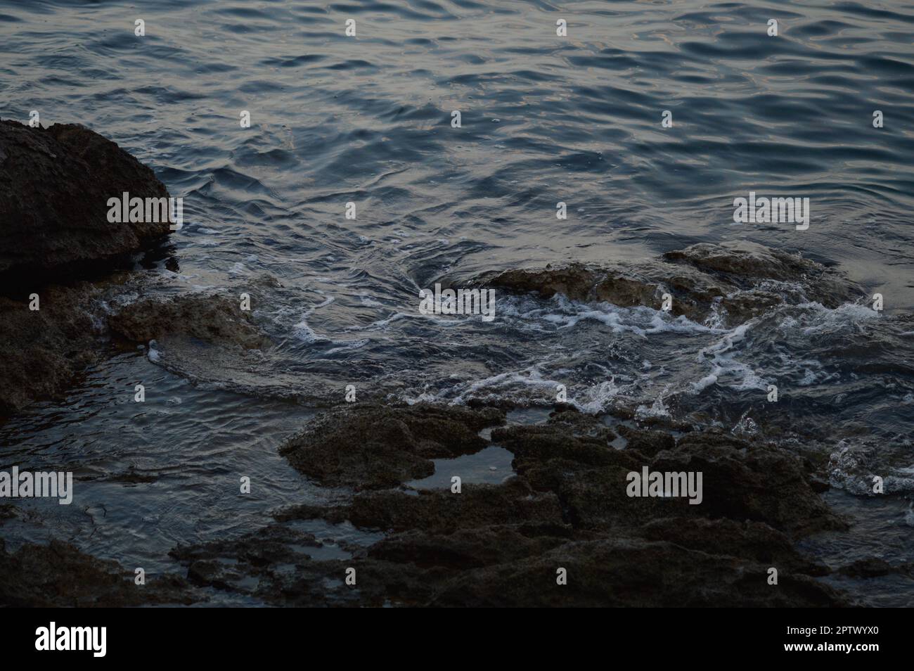 Sea waves crashing into rocks. Storm at the sea, dark, moody photo ...