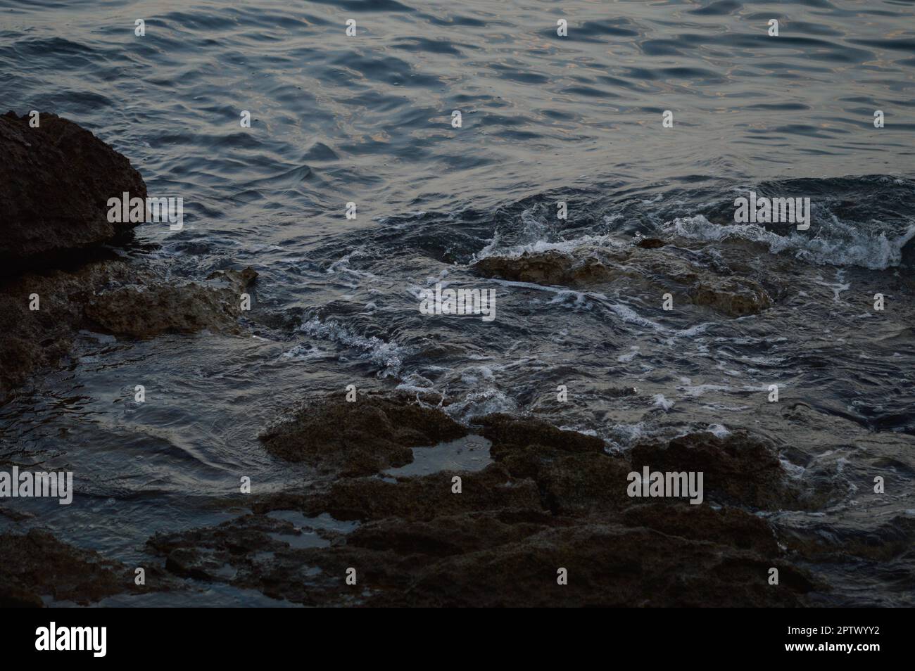 Sea waves crashing into rocks. Storm at the sea, dark, moody photo ...