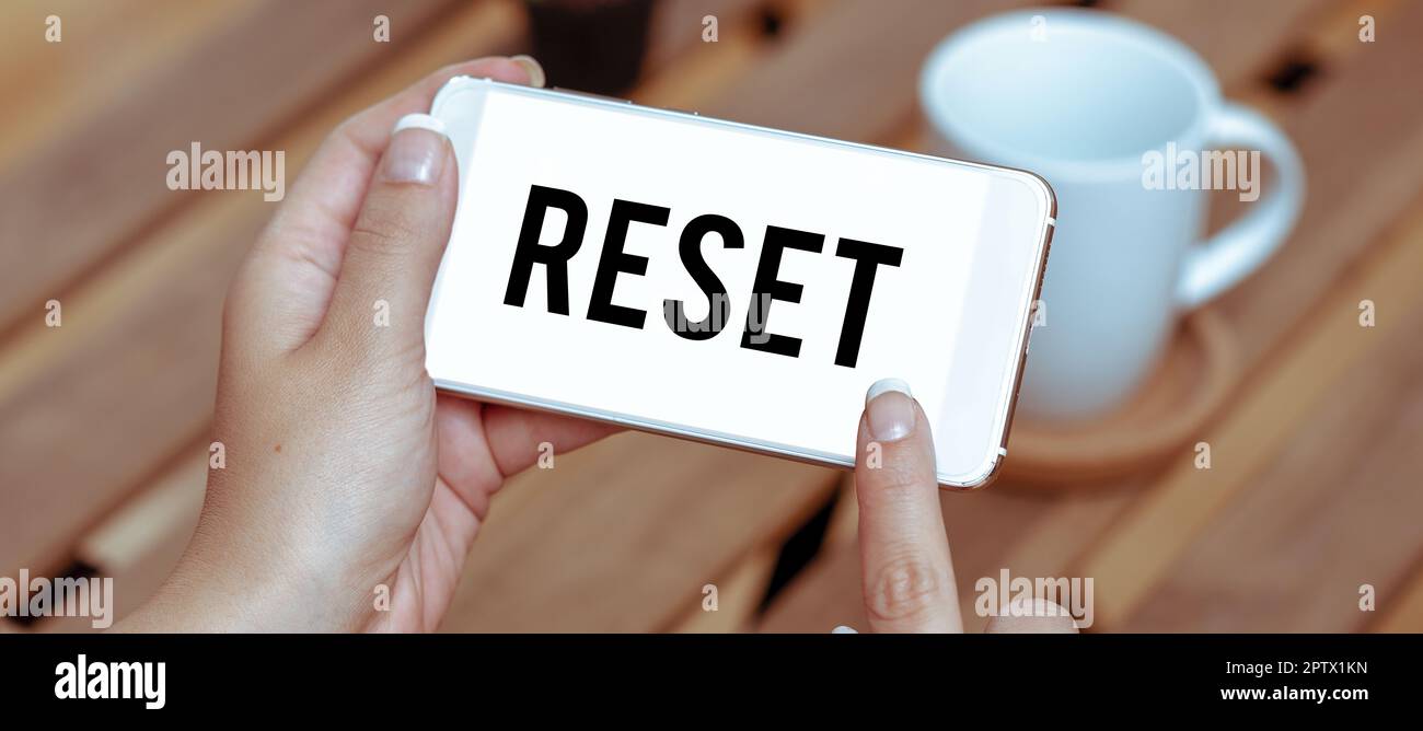 Text caption presenting Reset, Business approach cause device return to ...