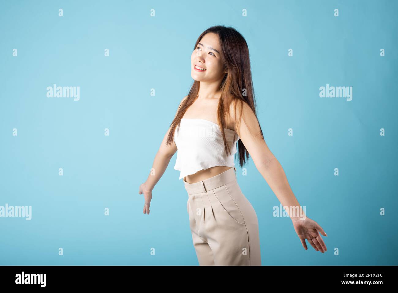 Happy woman smiling alone freedom carefree, Asian young female arms ...